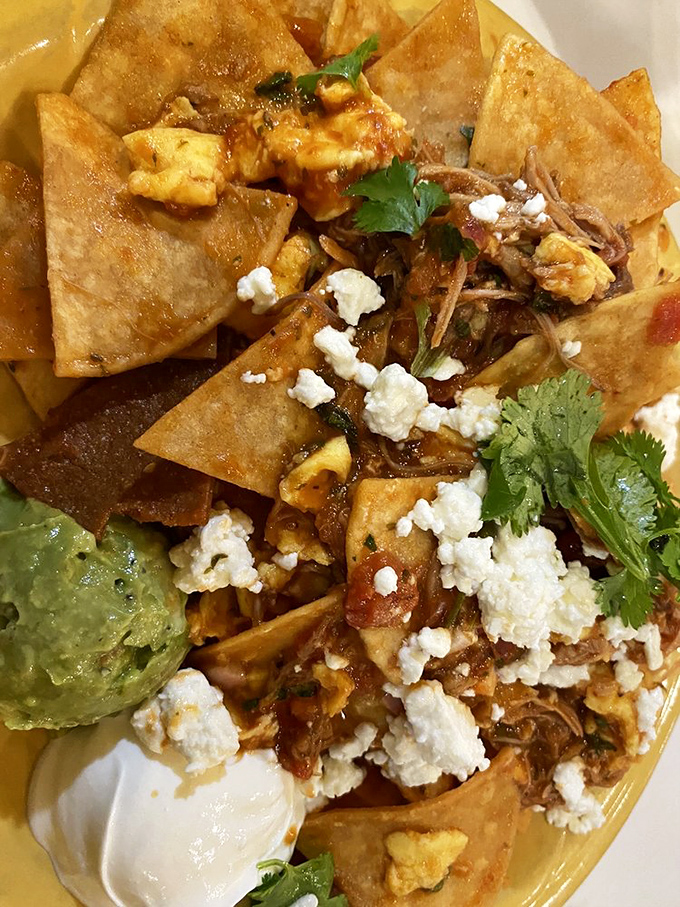 Chilaquiles that transport you straight to flavor town. Those crispy tortilla chips swimming in sauce are worth setting the alarm for.