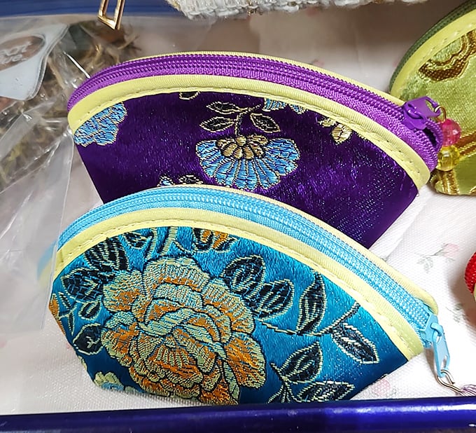 Silk coin purses in jewel tones that grandmother would approve of&mdash;perfect for storing your flea market bargaining money or vintage arcade tokens.