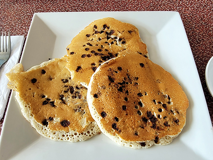 Chocolate chip pancakes that don't just have chips, but seem to have had a meaningful relationship with chocolate&mdash;fluffy, golden, and perfectly spotted.