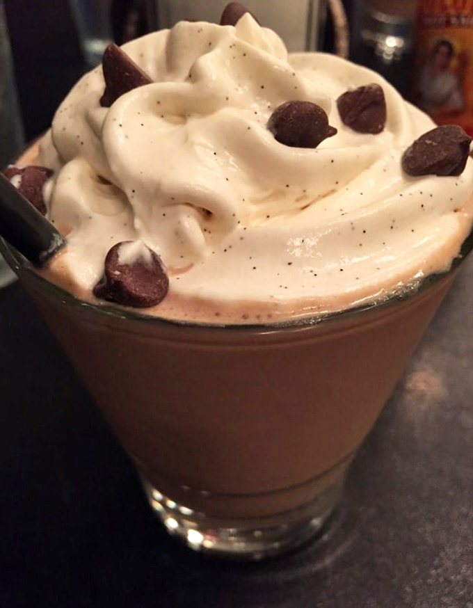 This isn't just a milkshake &ndash; it's a chocolate dream wearing a whipped cream hat, accessorized with chocolate chip confetti.