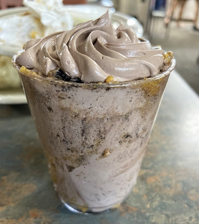 A chocolate mousse cup that whispers sweet nothings to your taste buds while your diet plan looks away in deliberate ignorance.