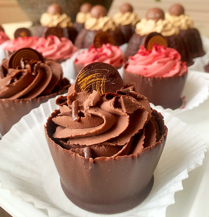 Chocolate mousse cups dressed for a gala. These aren't just desserts—they're tiny chocolate tuxedos waiting for their red carpet moment.