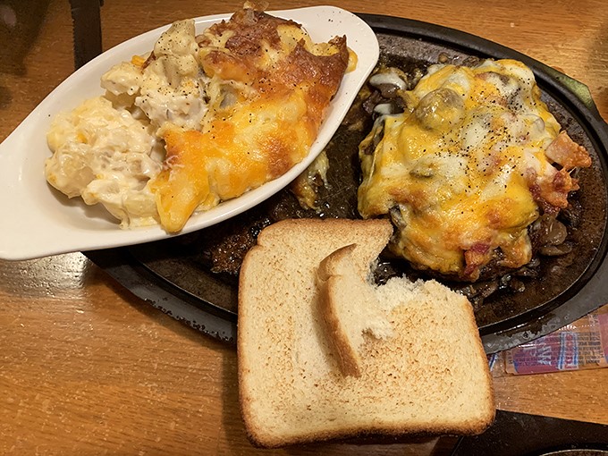Chopped sirloin smothered in melted cheese with a side of creamy potato salad. Comfort food that hugs you from the inside out.