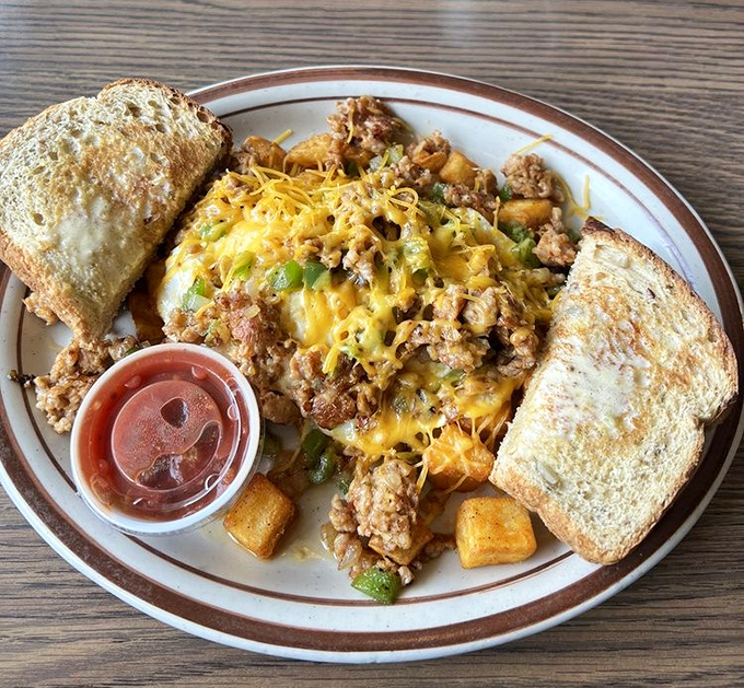The chorizo breakfast plate brings together eggs, potatoes, and toast in a harmony that would make any conductor jealous.