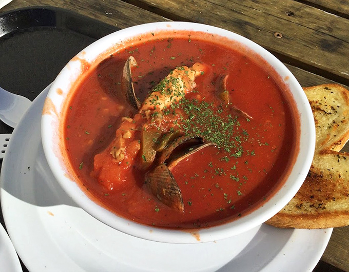 Cioppino that could make an Italian fisherman weep with joy. A tomato broth so rich it should have its own tax bracket.