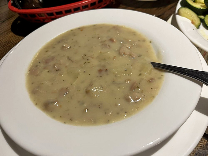 This isn't just clam chowder; it's a creamy hug in a bowl. Each spoonful contains tiny treasures from the deep.