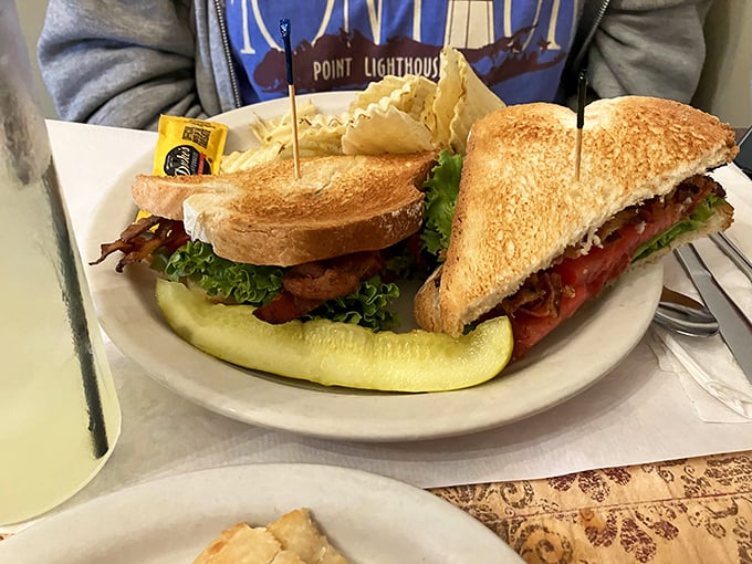 A club sandwich that doesn't need to show off&mdash;perfectly toasted bread, classic ingredients, and a pickle that knows its supporting role.