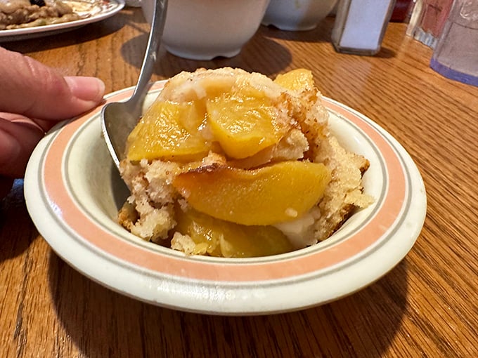 Warm peach cobbler that captures summer in Tennessee better than any postcard. The perfect marriage of fruit and buttery crust.