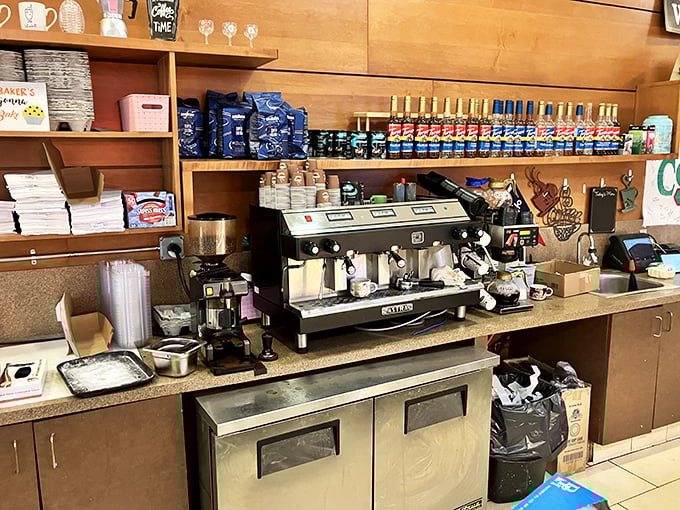 The coffee station&mdash;where Italian tradition meets caffeine necessity. This espresso machine has probably witnessed more morning revelations than a therapist's couch.