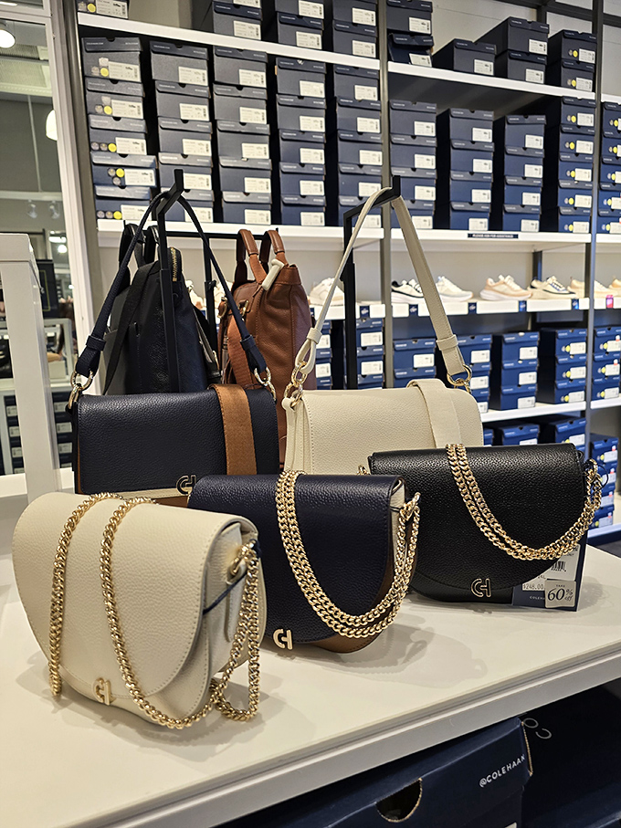 Designer handbags with chain straps and outlet prices create that perfect "I'm fancy but financially savvy" aesthetic everyone craves.