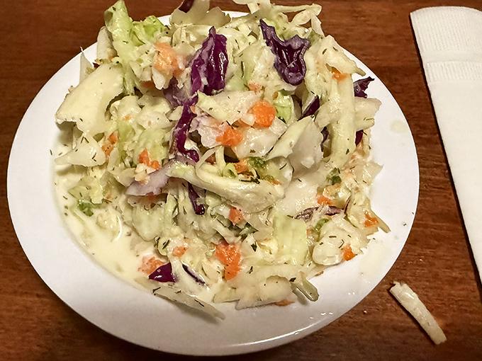 Not your cafeteria coleslaw! This crunchy, colorful creation provides the perfect cool contrast to all that smoky meat.