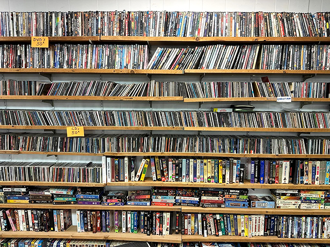 The DVD wall that time forgot&mdash;a physical Netflix from the pre-streaming era where movie night selections come with bonus vintage vibes.