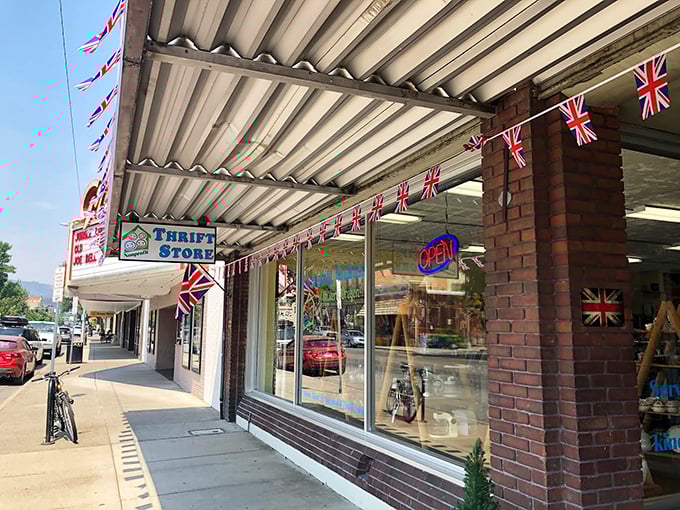 Union Jack flags flutter outside a thrift store&mdash;one of many budget-friendly shopping options where retirement dollars stretch further than British empire ambitions once did.