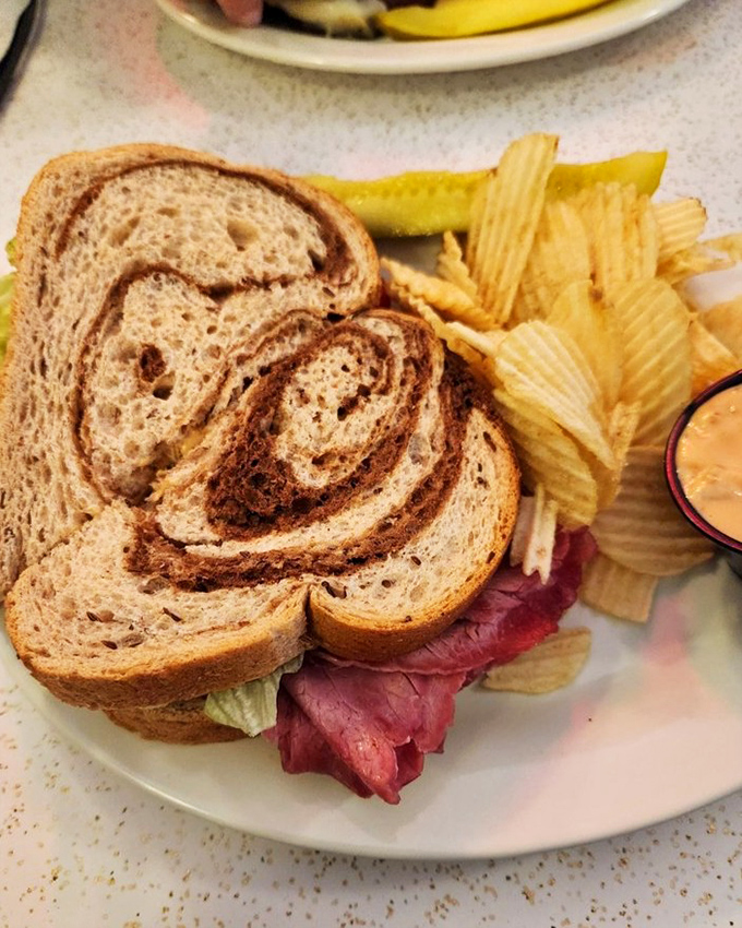 Marbled rye holding court with corned beef and chips. This sandwich doesn't need to boast&mdash;its reputation has been spreading through St. Louis for generations. 