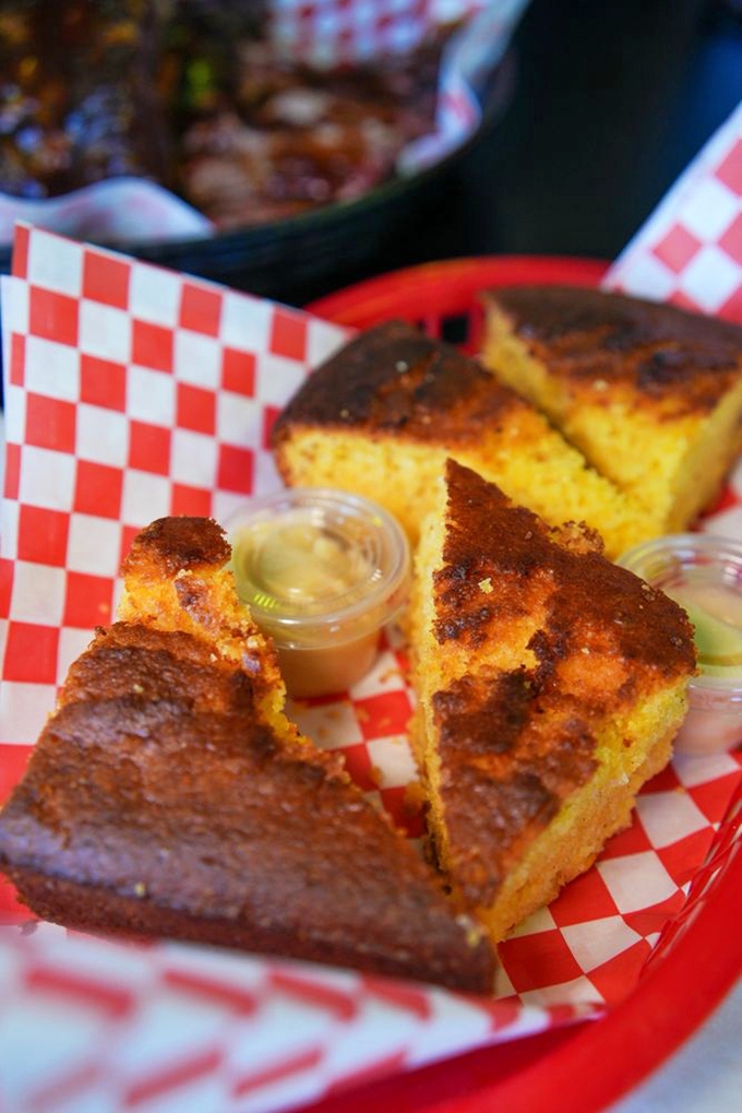 Cornbread that walks the perfect line between sweet and savory. These golden triangles with honey butter are the supporting actors that steal the show.