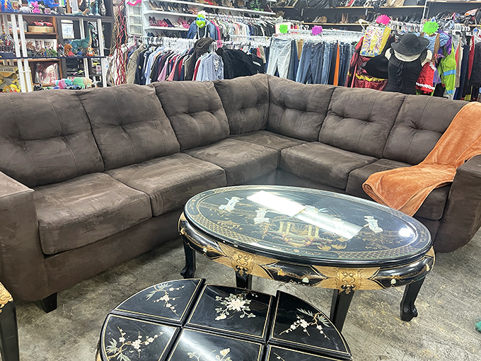 Sectional seating with that "Mad Men" appeal. The ornate coffee table adds just enough drama to make your living room gossip-worthy.