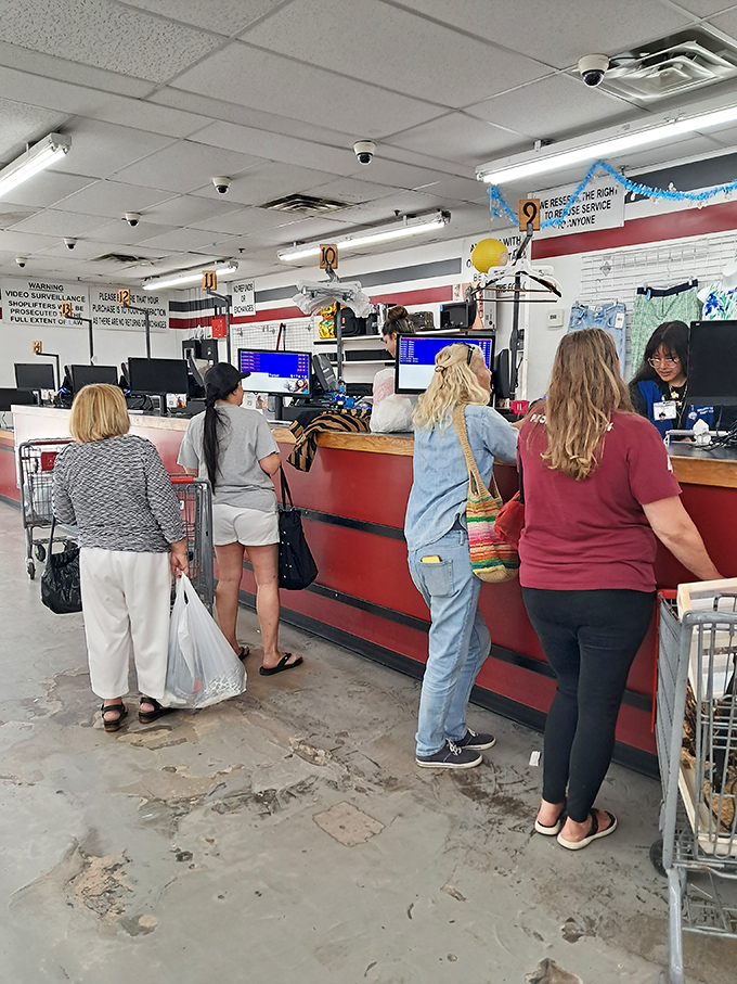 The final frontier of your thrifting journey&mdash;where friendly cashiers tally your treasures while fellow hunters eye your cart with not-so-subtle envy.