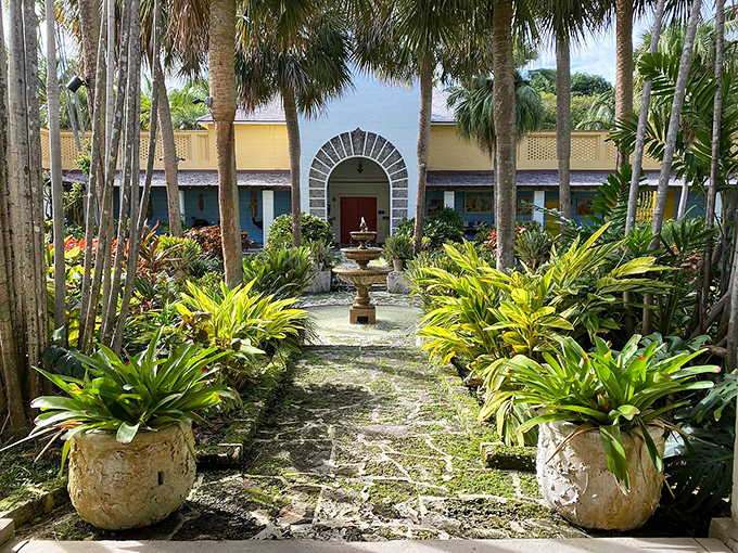 Another courtyard, another fountain&mdash;this symmetrical garden path leads the eye toward an arched doorway promising more wonders inside.