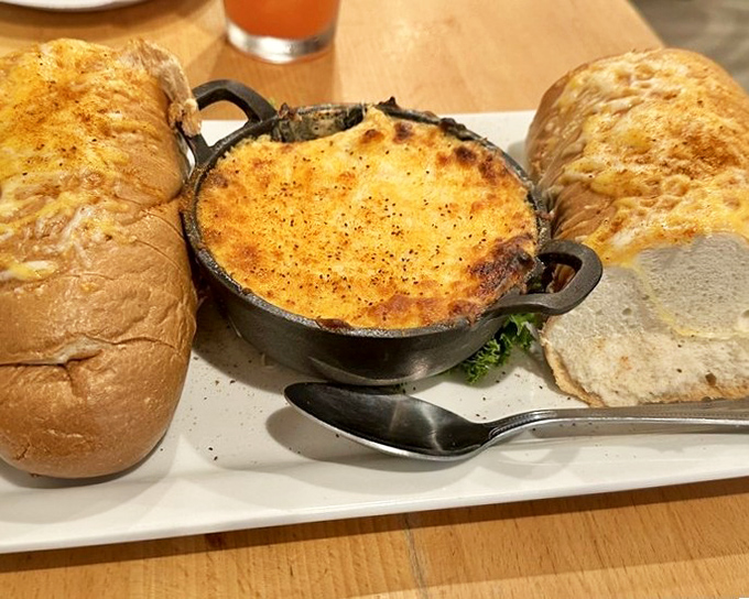 This bubbling cauldron of creamy crab dip isn't just an appetizer—it's a molten treasure chest of Maryland's finest export, ready for bread-based excavation.