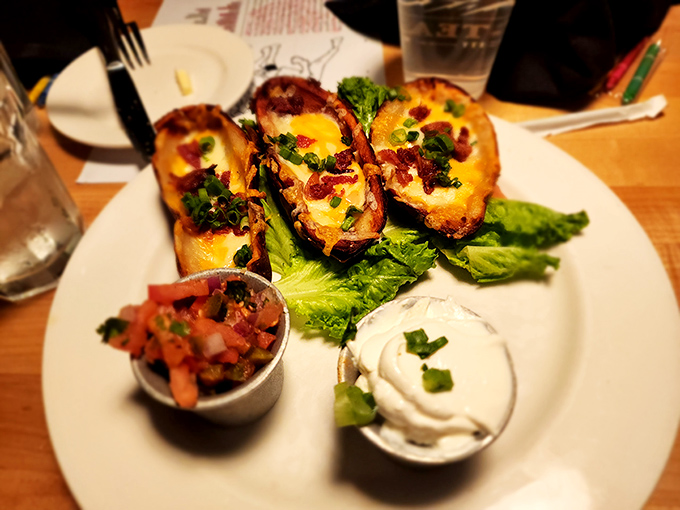 These aren't just potato skins&mdash;they're edible canoes filled with treasure. The sour cream and salsa are there for dipping, dunking, or artistic expression.