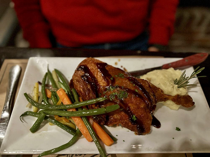 Duck that's traveled the silk road to your plate, glistening with glaze and perfectly paired with seasonal vegetables. A dish worth quacking about.