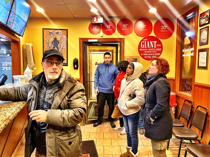 The waiting area at J.B. Alberto's&mdash;where strangers united by hunger become comrades in the noble pursuit of pizza.
