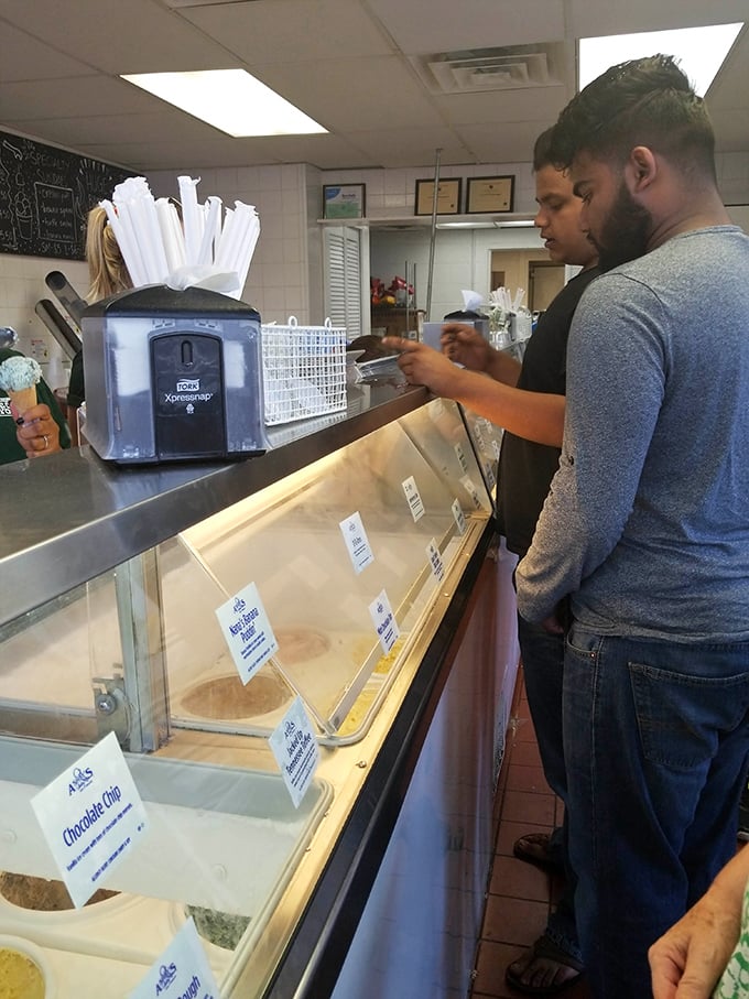 The anticipation is part of the experience—customers contemplating life's most important question: which of Clark's many flavors deserves their devotion today?