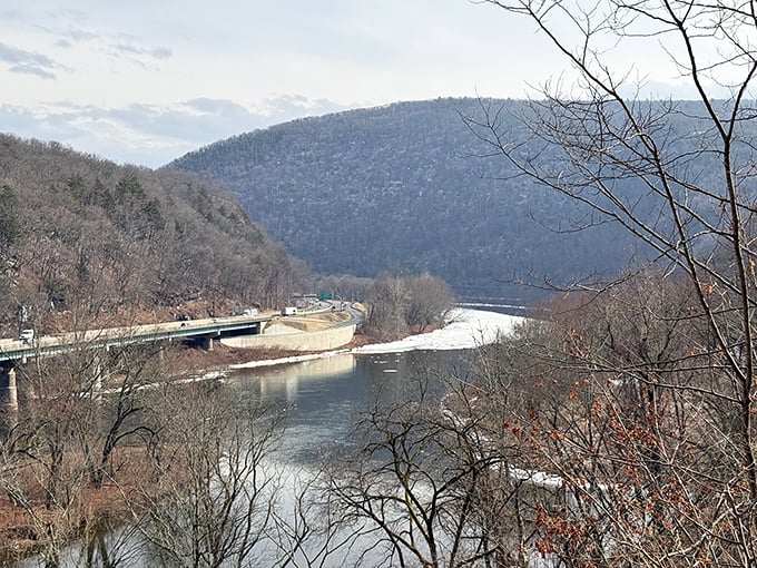 Winter's stark beauty revealed. The Delaware River continues its journey while the landscape takes a well-deserved seasonal nap.