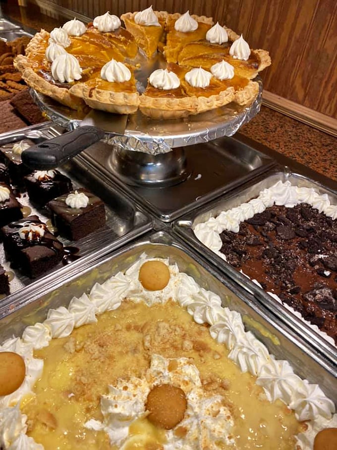 Banana pudding with vanilla wafers, pumpkin pie with whipped cream dollops, and chocolate cake&mdash;the holy trinity of Southern desserts all in one blessed buffet.