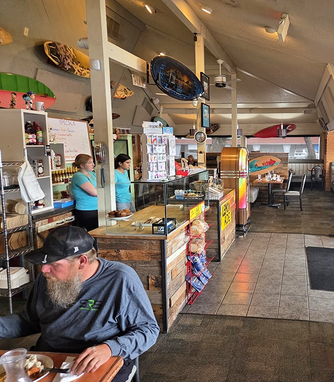 The open kitchen concept lets you watch breakfast magic happen while soaking in that authentic neighborhood diner atmosphere.