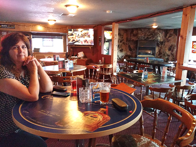 The dining area's warm wood tones and casual seating create that "everybody knows your name" vibe that's increasingly rare in Portland's trendier spots.