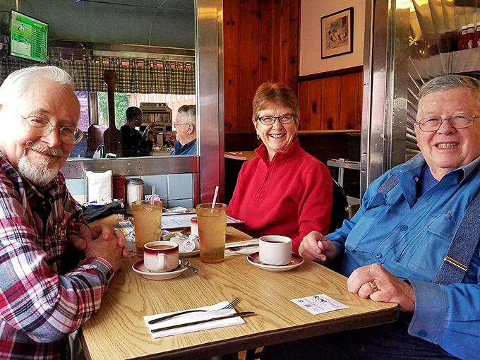 These happy diners aren't just enjoying coffee&mdash;they're participating in a ritual of community that's increasingly rare in our digital world.