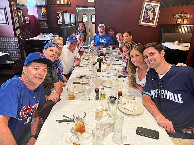 Nothing says "Chicago neighborhood institution" like a long table of Cubs fans celebrating with pizza and pasta after a game at Wrigley.