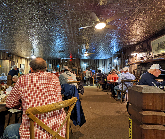 The embossed tin ceiling watches over generations of diners who've made the pilgrimage to this temple of Tennessee catfish.