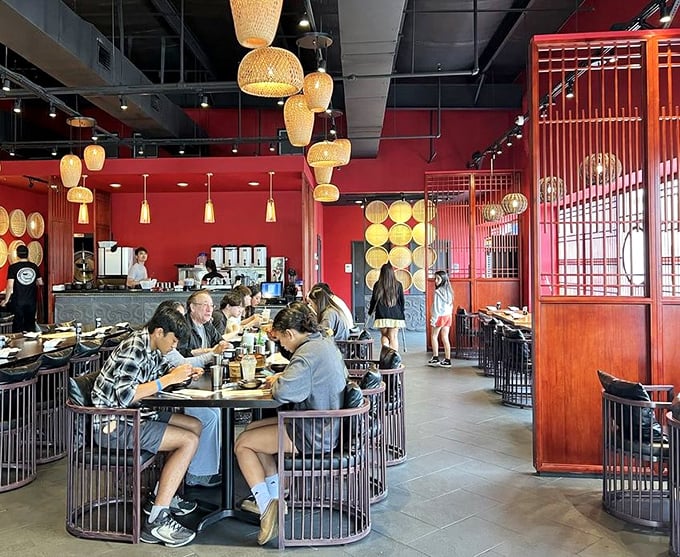 The circular booth seating creates little islands of conversation and shared plates &ndash; dining as it should be, communal and joyful.