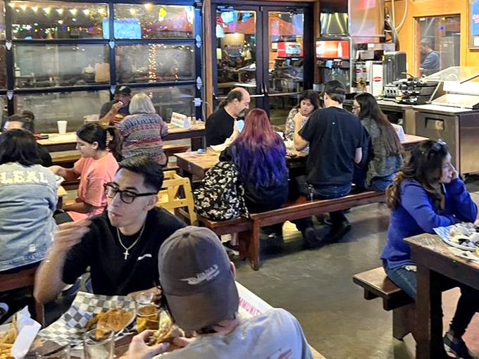 The dining room buzzes with the universal language of "mmm" and "you've got to try this," punctuated by occasional napkin emergencies.