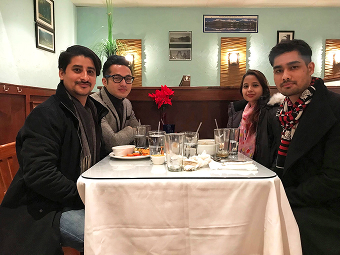 The restaurant creates a space where memories are made between bites. These diners aren't just eating dinner—they're collecting stories.