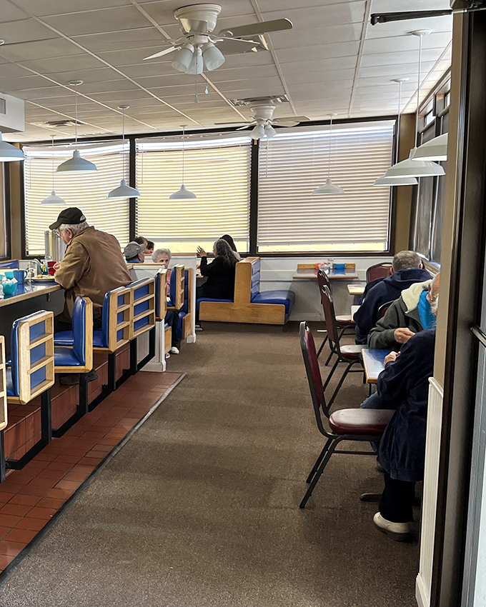 Real people enjoying real breakfast in real booths &ndash; this is what community and comfort food look like together.