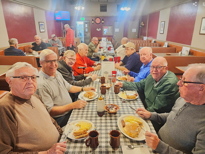 The morning crew gathering for their regular breakfast club. These tables have heard more local news than any newspaper.