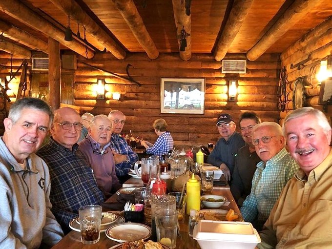 The regulars' table – where barbecue stories are swapped, friendships are forged, and sauce stains are badges of honor.