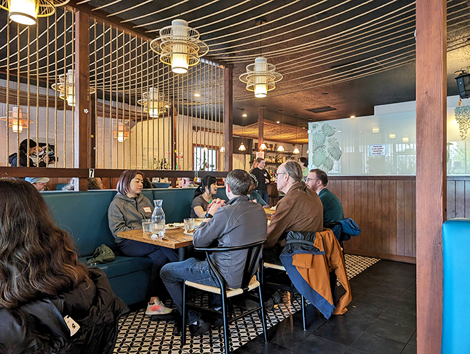 The dining room hums with the universal language of good food, as patrons lean into conversations fueled by exceptional flavors and comfortable surroundings.