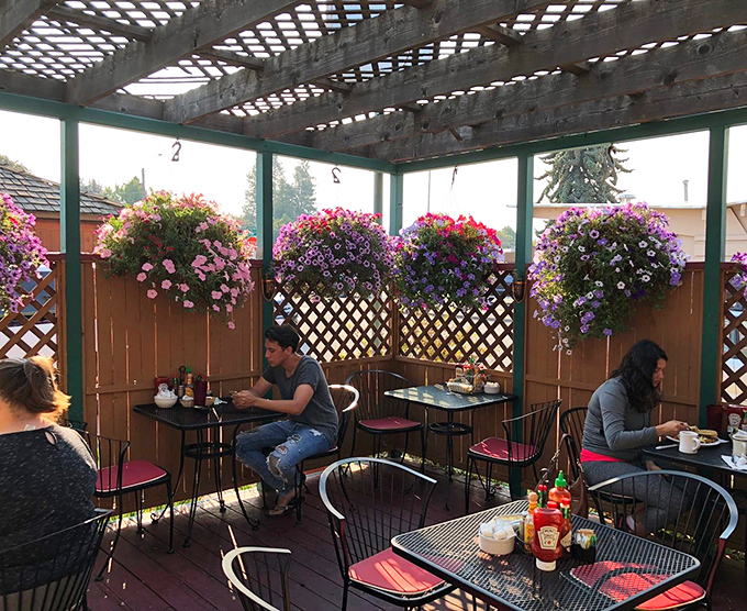 The outdoor patio&mdash;where hanging flowers create nature's chandelier and breakfast conversations flow as easily as the coffee refills.