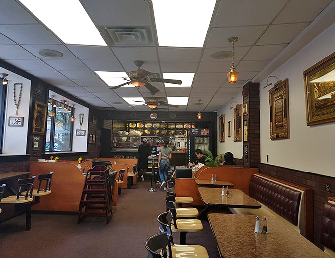 The dining room buzzes with a diverse crowd of regulars and first-timers, all united by the universal language of "mmm" and "pass the napkins."