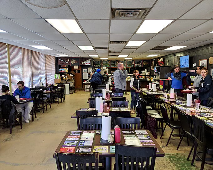 A bustling dining room where strangers become friends over the universal language of "mmm." The full tables tell you everything you need to know.