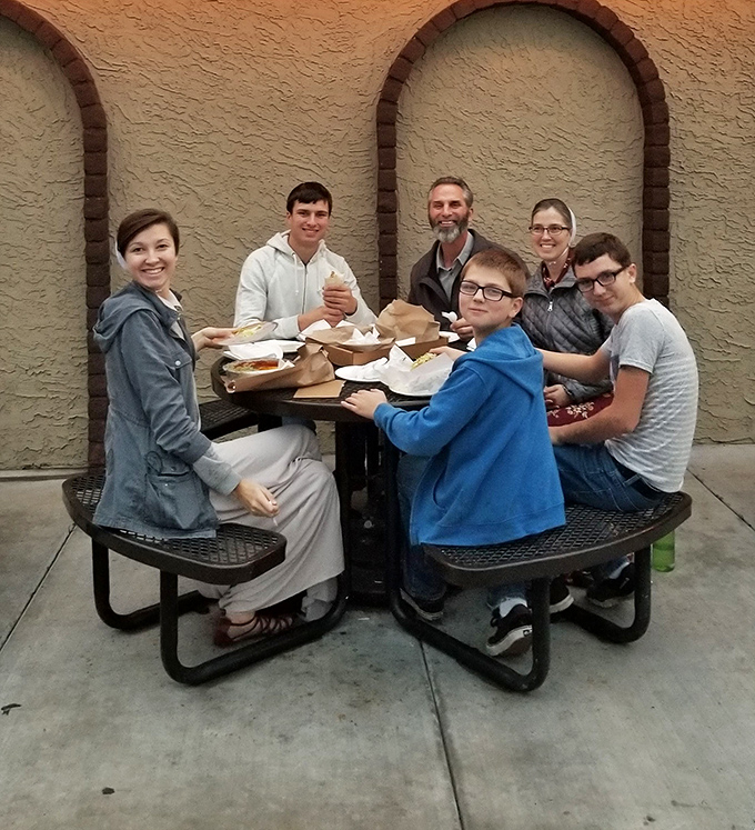 The universal language of good food bringing people together. No smartphones in sight, just humans enjoying the moment and each other.