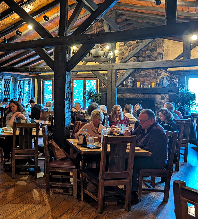 The dining room buzzes with conversation and clinking glasses under wooden beams that have witnessed decades of "just one more bite."