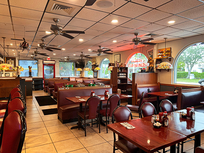 The dining room hums with conversation and clinking silverware &ndash; a symphony of satisfaction that's been playing daily for years in this Oakland Park institution.