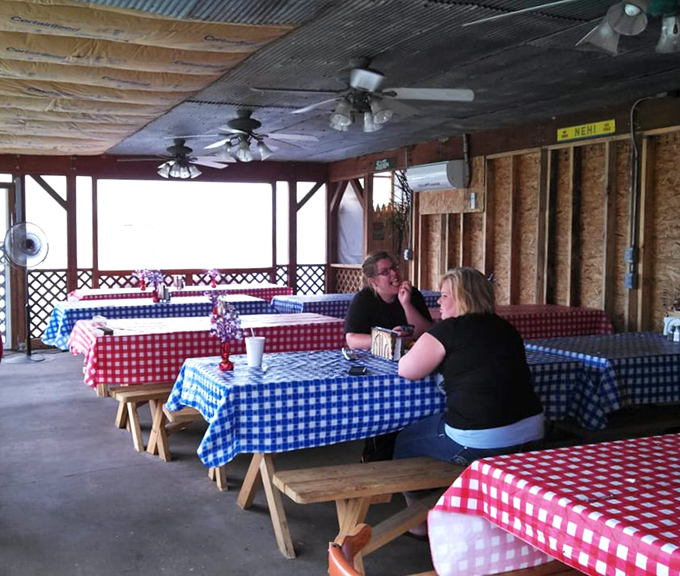 The covered patio offers a chance to enjoy your feast al fresco, where picnic tables and good company enhance the already stellar barbecue experience.