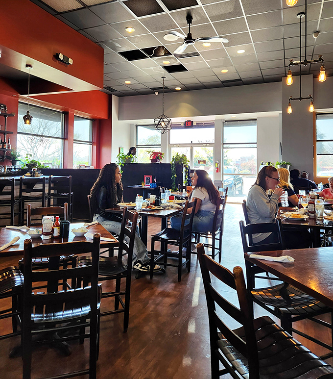 The dining room hums with the universal language of satisfied customers. Notice nobody's looking at their phones&mdash;the food has their full attention.