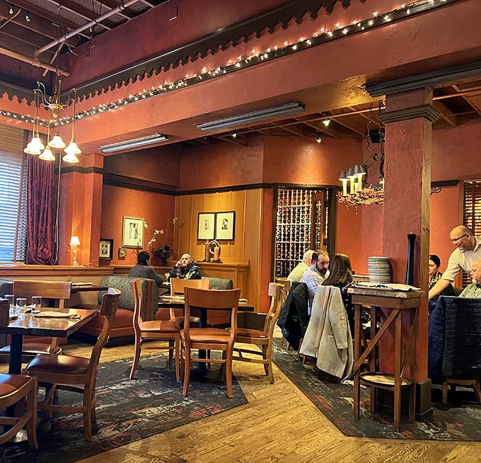 The warm wood and terra cotta walls don't just house diners; they embrace them in what feels like Alaska's coziest culinary hug.
